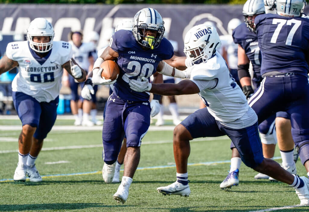 Football Dominates Georgetown in First 2022 Win - The Outlook